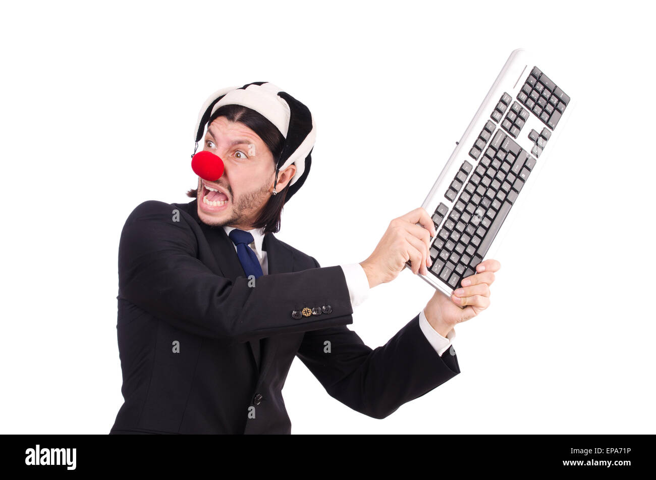Funny clown with keyboard isolated on white Stock Photo - Alamy