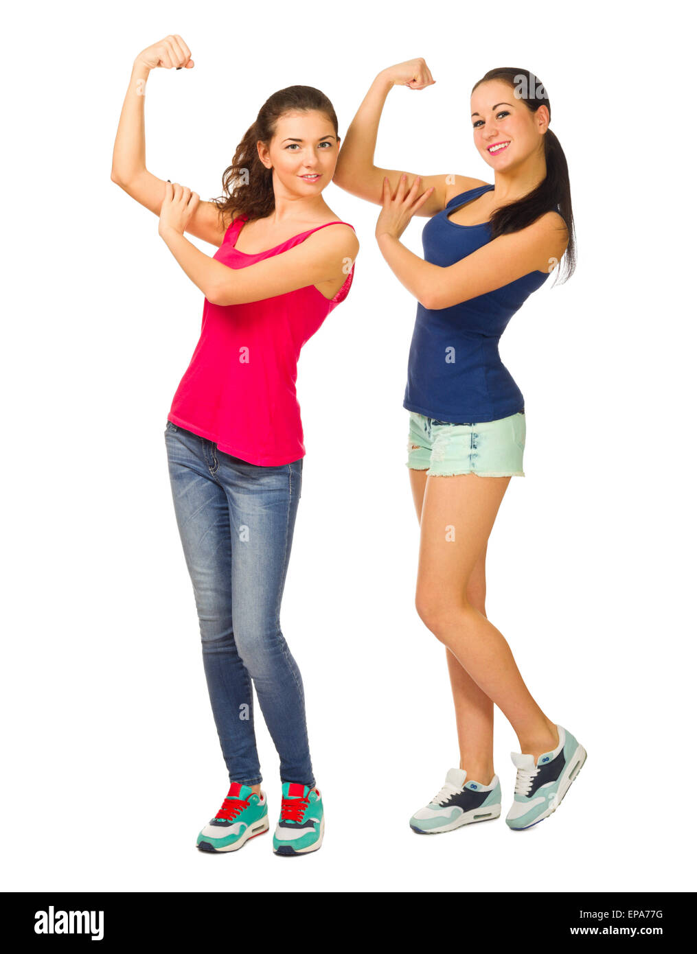 Two young sporty smiling girls isolated Stock Photo - Alamy