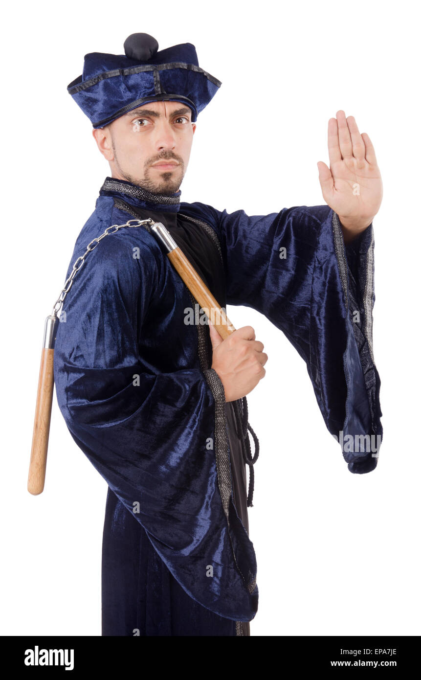 Martial arts master with nunchucks on white Stock Photo - Alamy