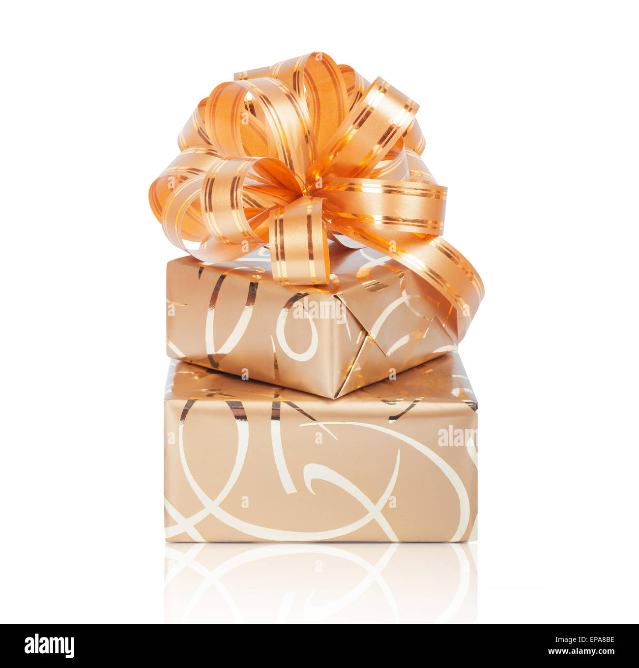 Beautiful Gift box in gold wrapping paper isolated on a white ...