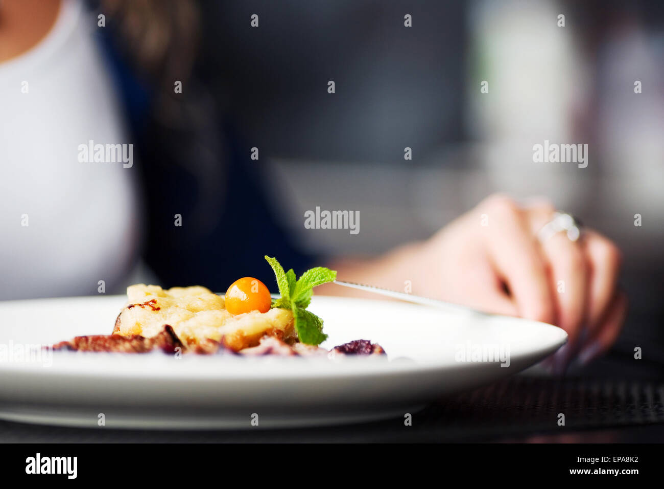 Female hand with a dinner at restaurant Stock Photo - Alamy
