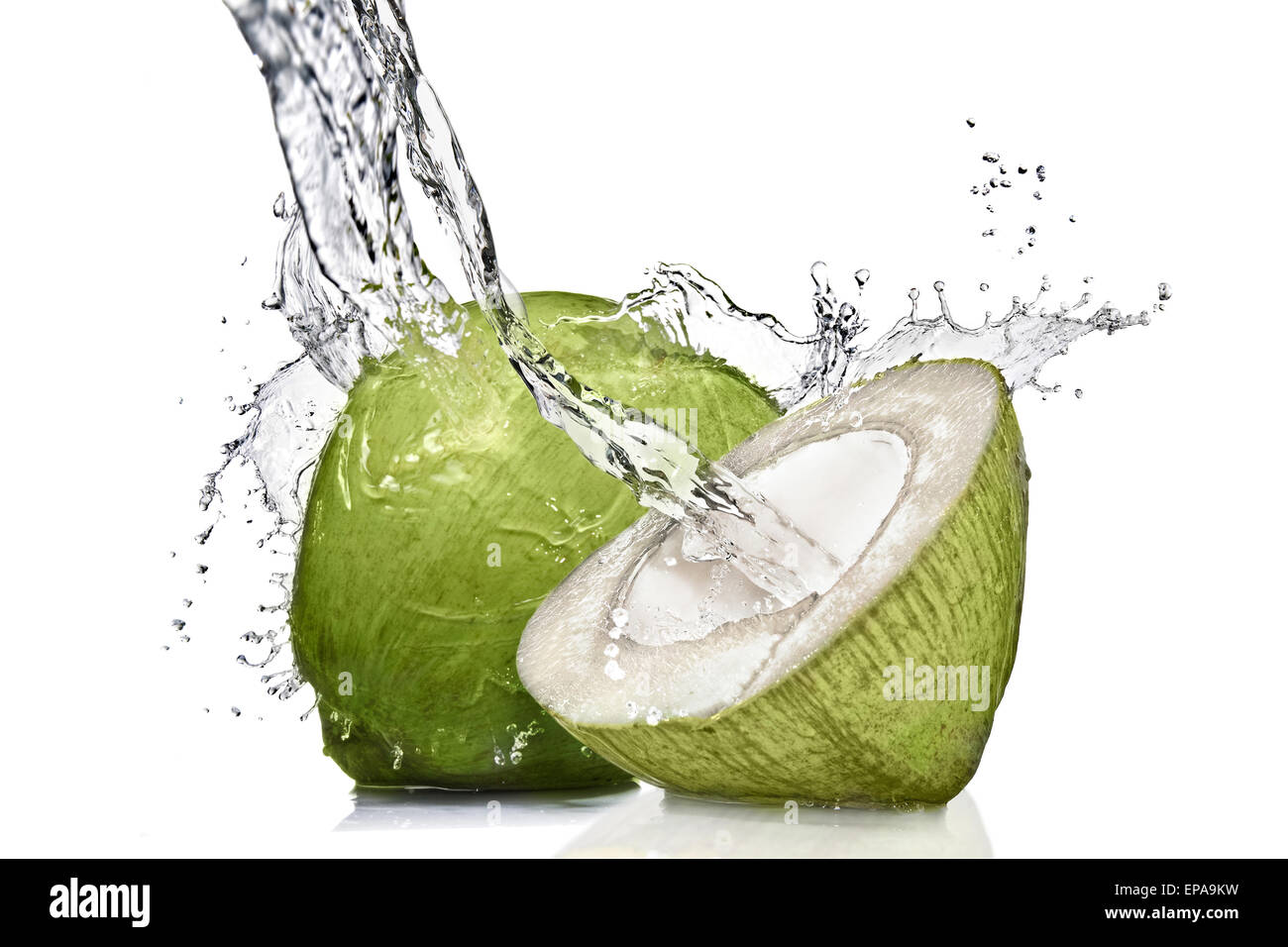 splash of water on green coconut isolated on white Stock Photo - Alamy
