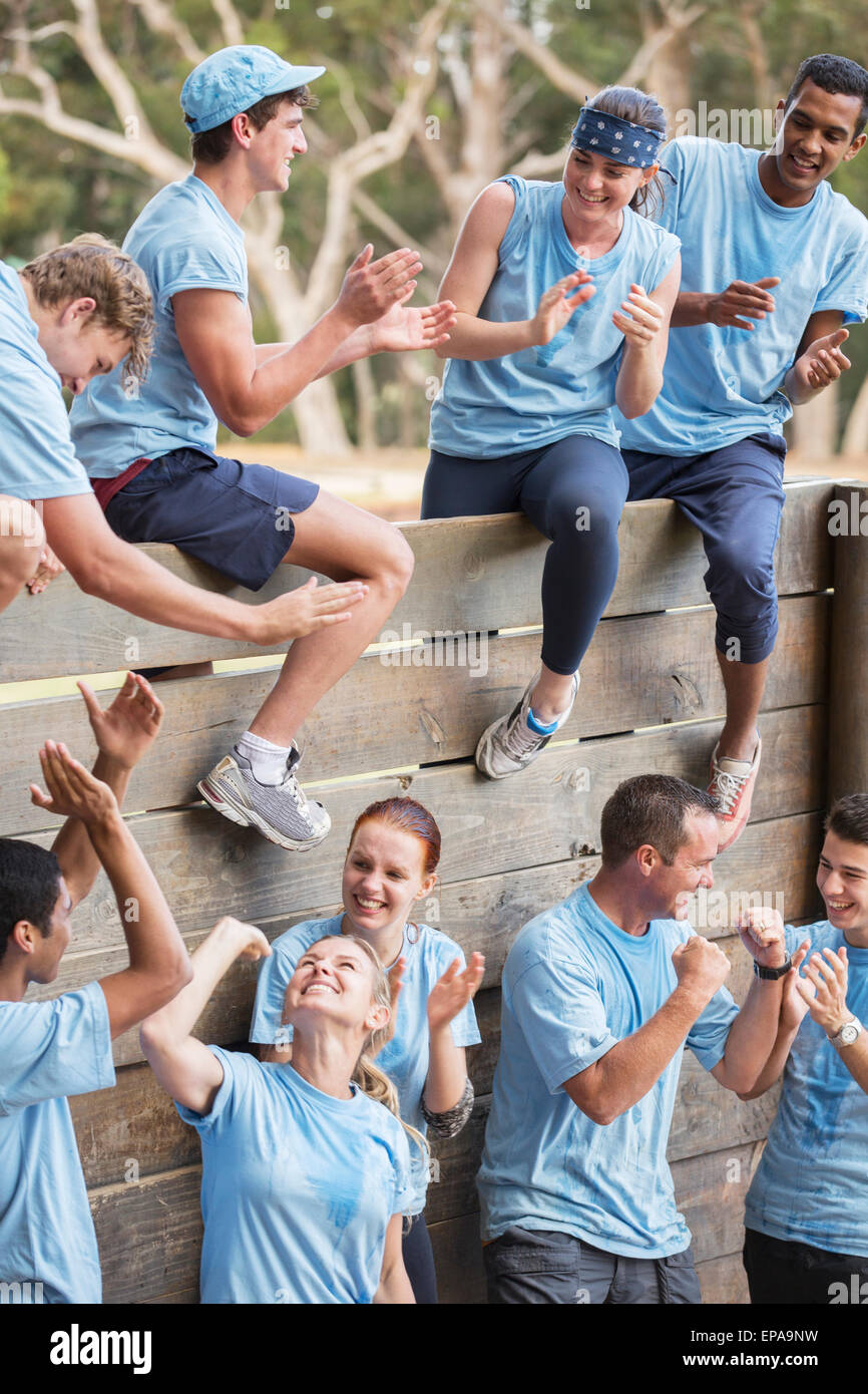 team clapping celebration wall boot camp Stock Photo - Alamy