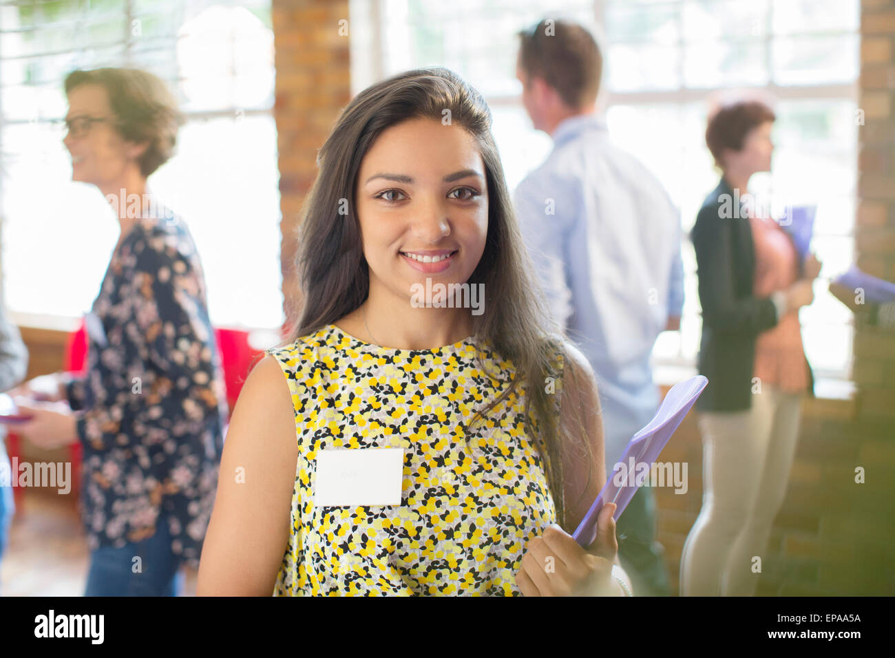 portrait smiling woman Community center Stock Photo - Alamy
