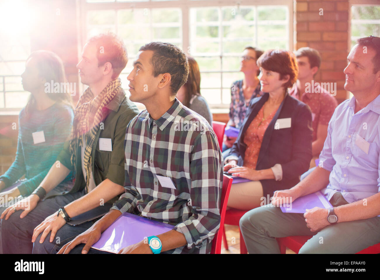 attentive audience listening Community center Stock Photo - Alamy