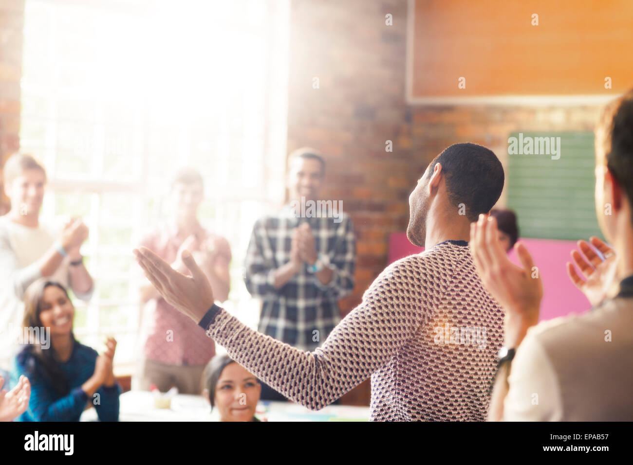 Young african man clapping smiling hi-res stock photography and images ...