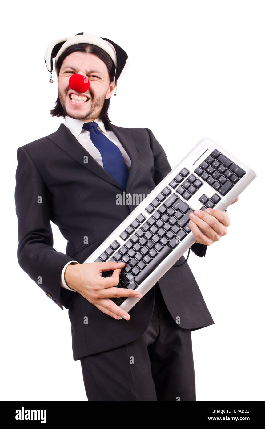 Funny clown with keyboard isolated on white Stock Photo - Alamy