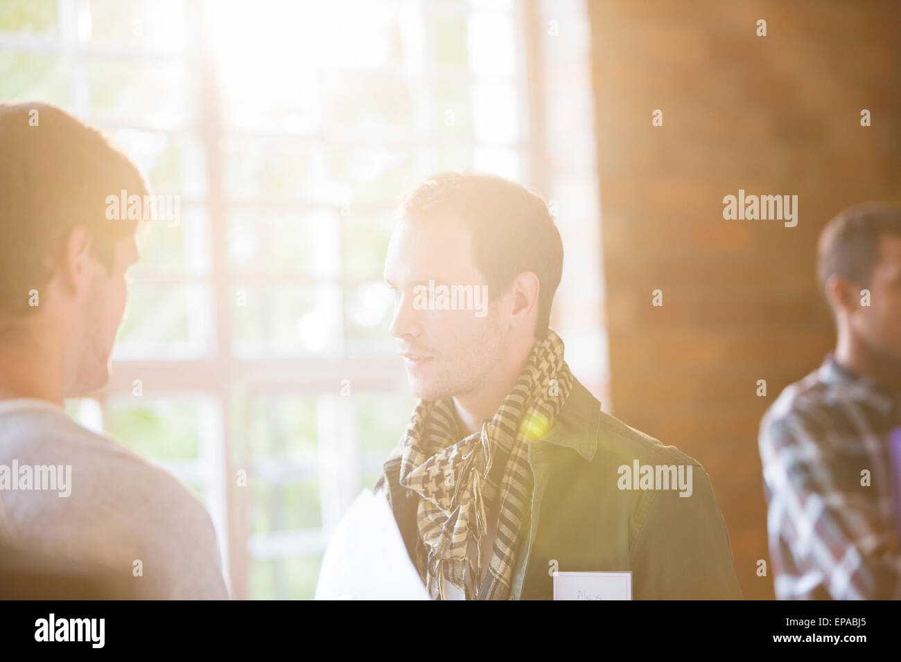 man talking sunny Community center Stock Photo - Alamy
