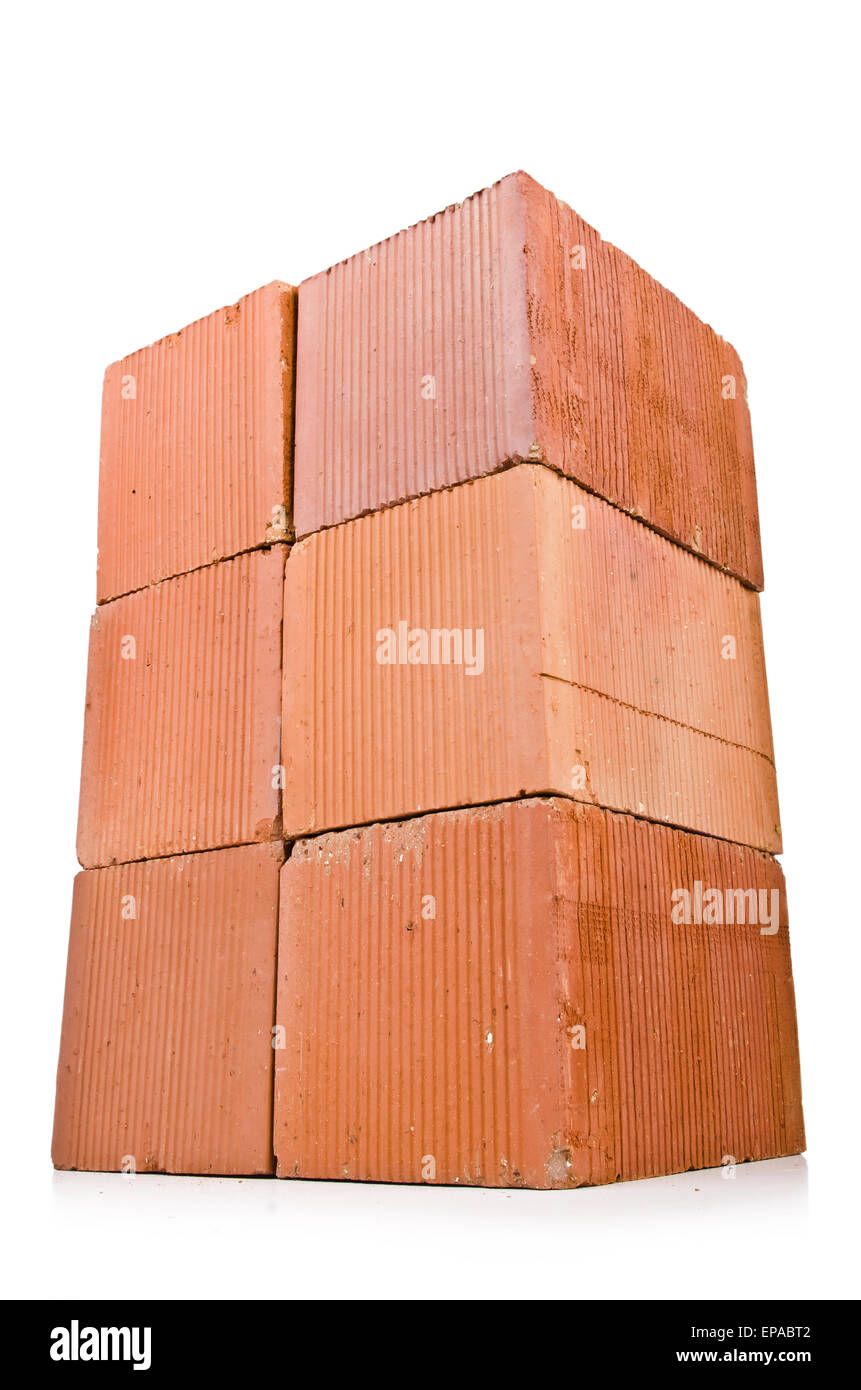 Stack of clay bricks isolated on white Stock Photo - Alamy