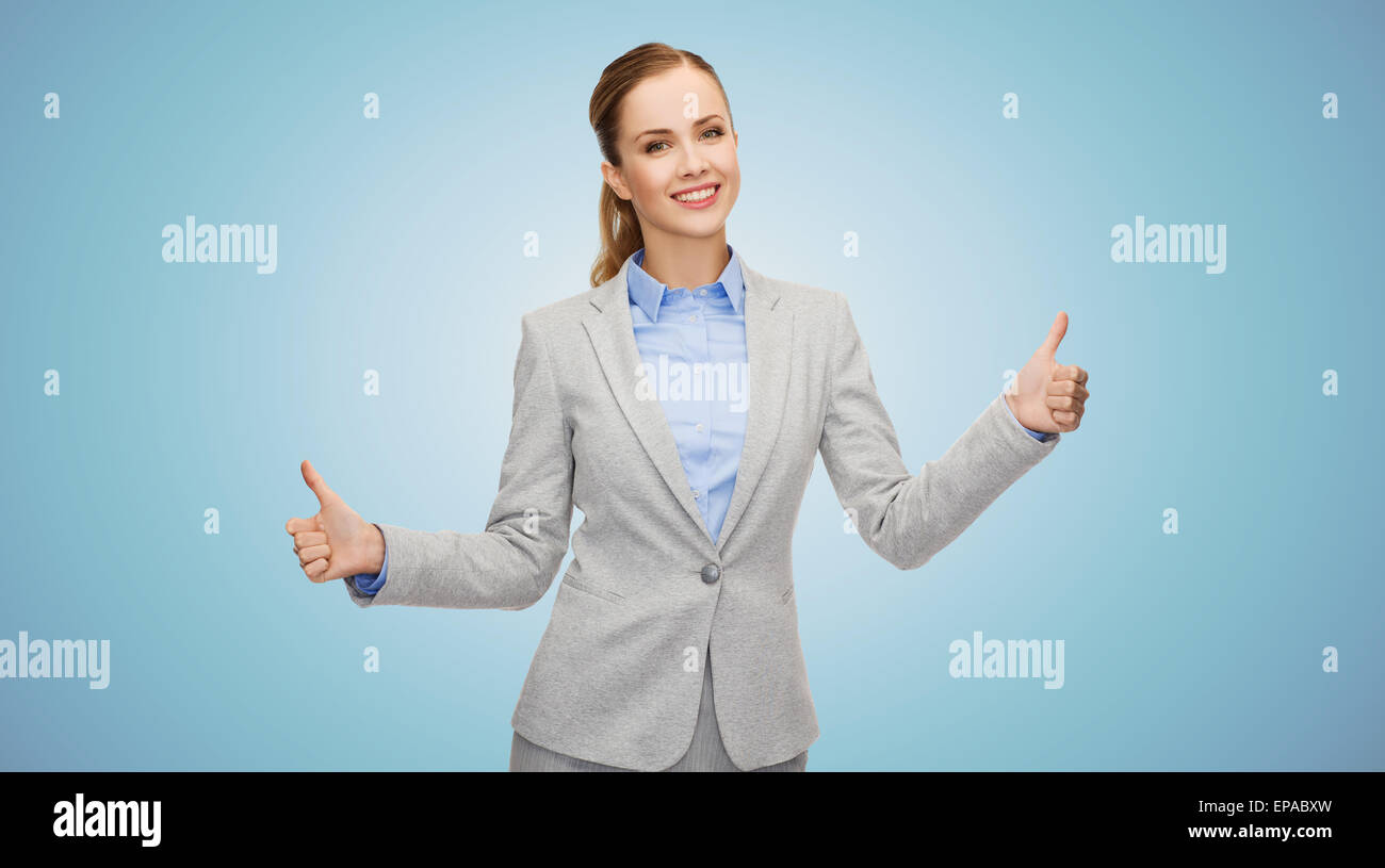smiling businesswoman showing thumbs up Stock Photo - Alamy smiling businesswoman showing thumbs up Stock Photo - Alamy