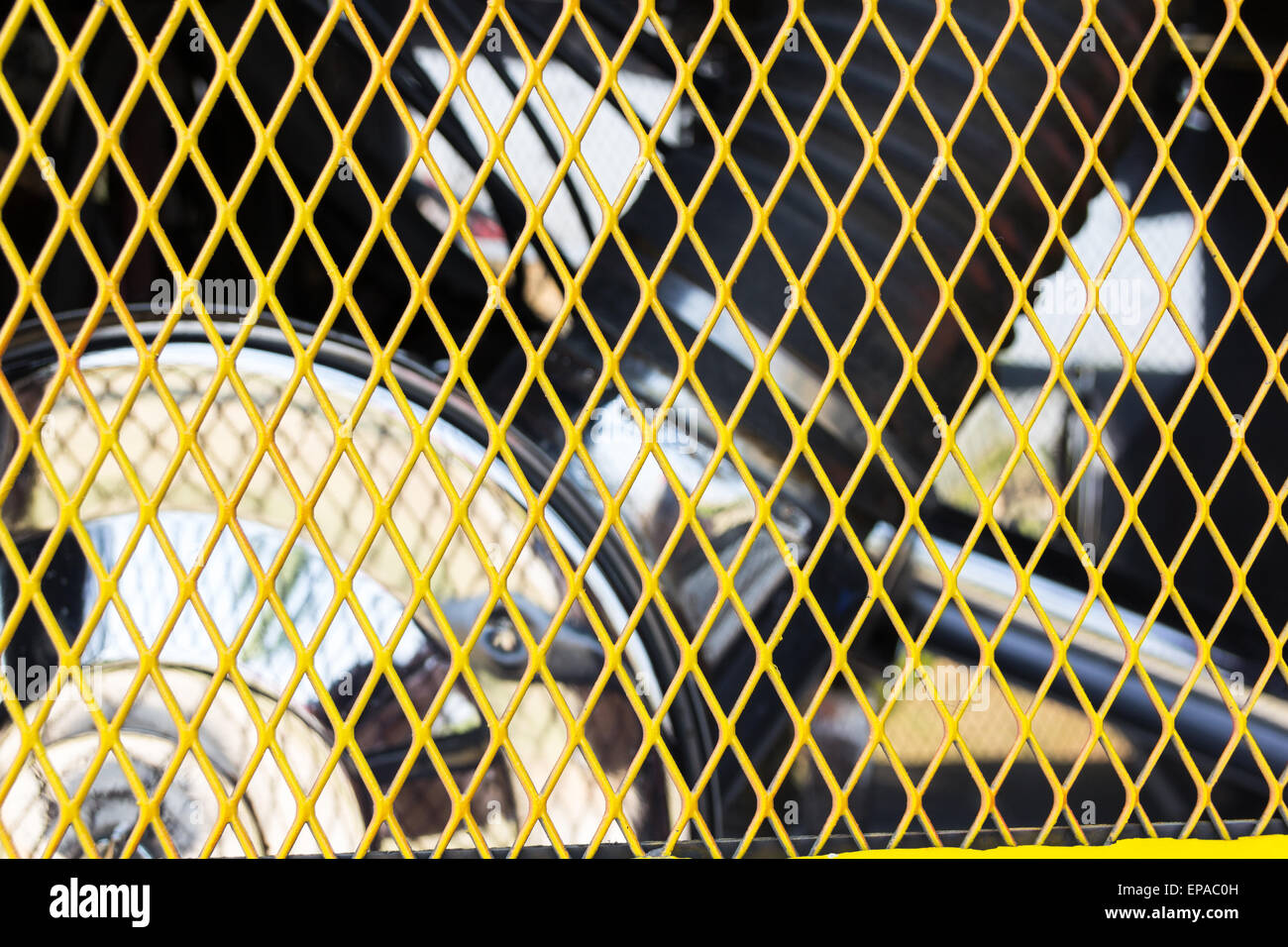 Rear view of bus with closed hood of bus engine, protecting grille ...