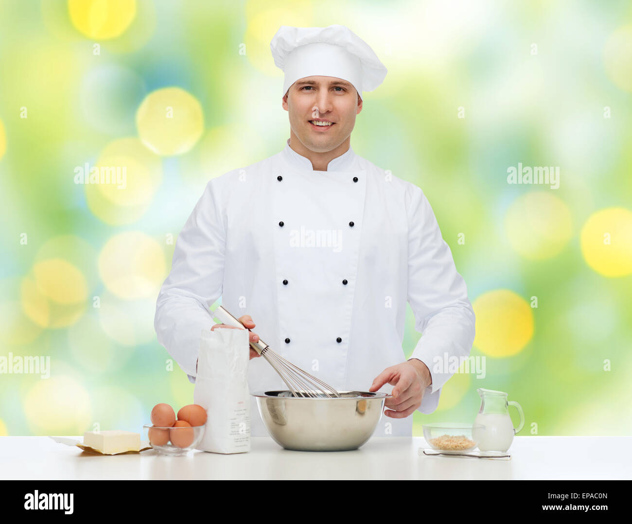 happy male chef cook baking Stock Photo - Alamy