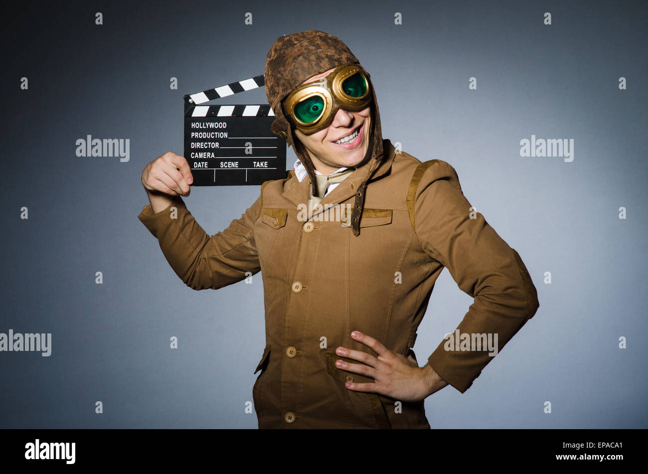 Funny pilot with goggles and helmet Stock Photo - Alamy