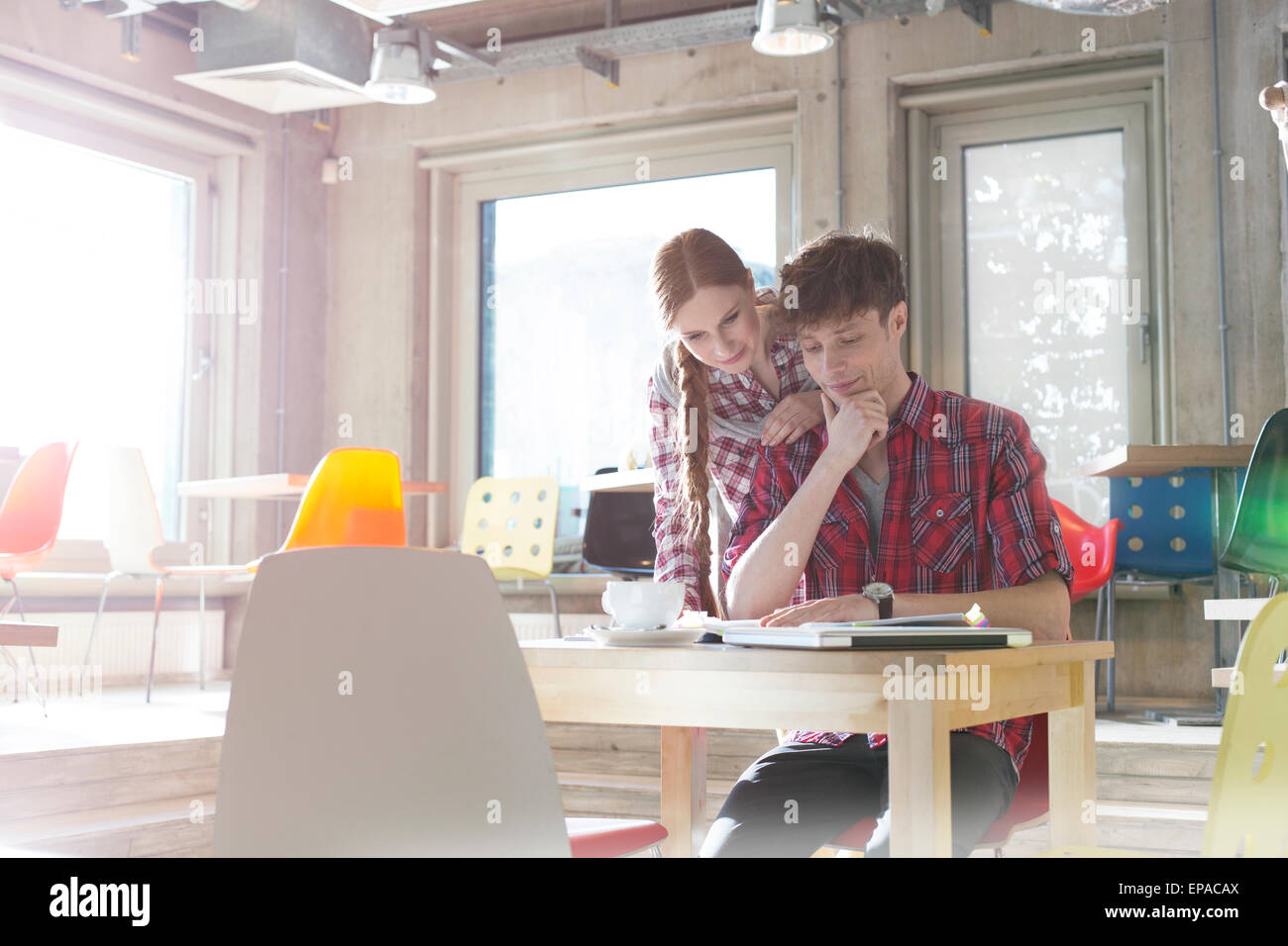 creative business people reading office Stock Photo - Alamy