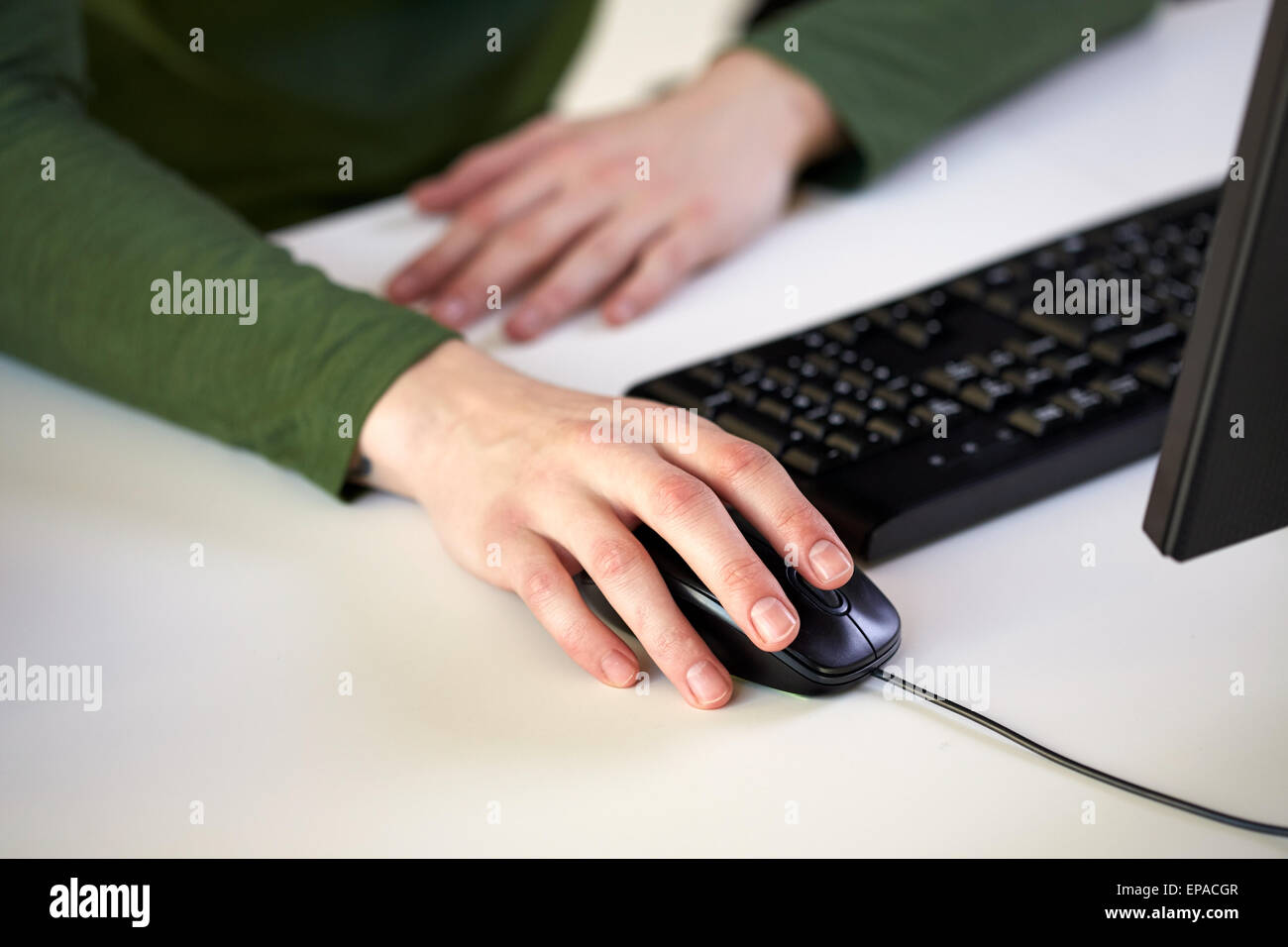 close up of male hands holding computer mouse Stock Photo - Alamy