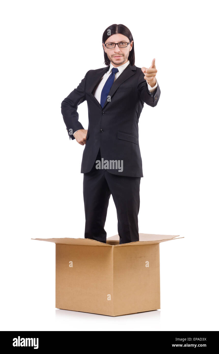 Man in thinking out of the box concept Stock Photo - Alamy