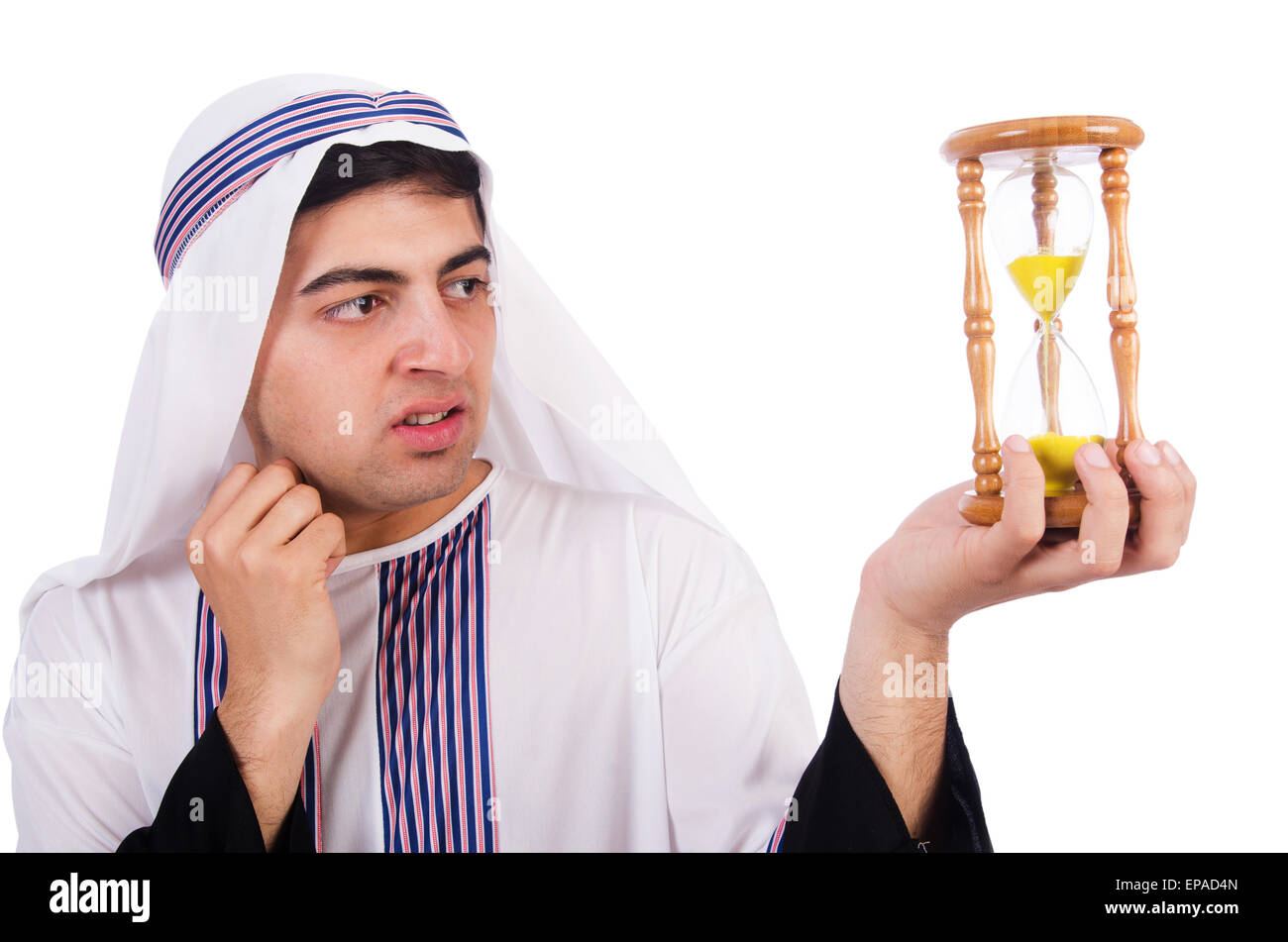 Arab man thinking about passage of time Stock Photo - Alamy