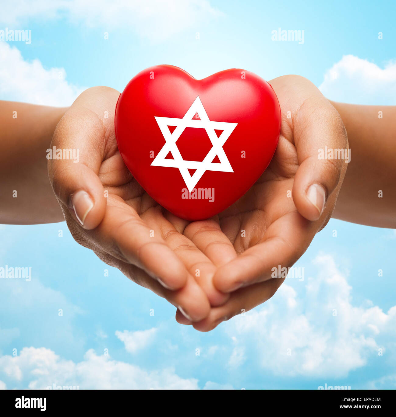 close up of hands holding heart with jewish star Stock Photo - Alamy