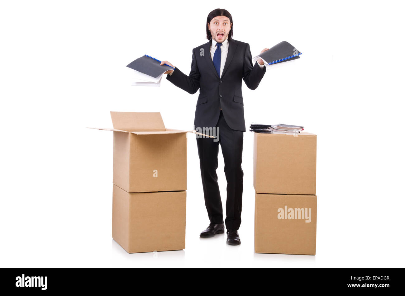 Man with boxes full of work Stock Photo - Alamy