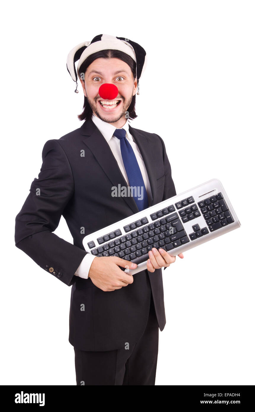 Funny clown with keyboard isolated on white Stock Photo - Alamy