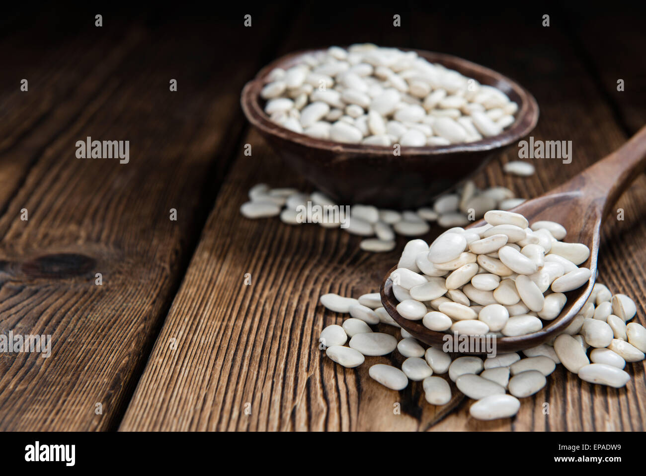 Dried White Beans (close-up shot) on wooden background Stock Photo - Alamy