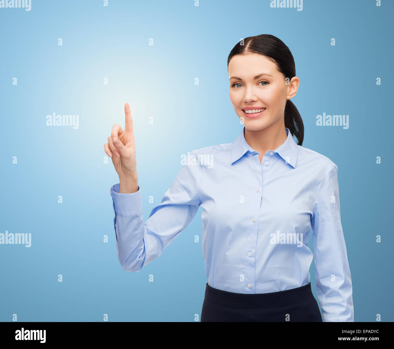 businesswoman touching something imaginary Stock Photo - Alamy