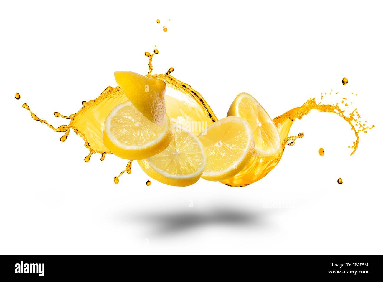 Falling slices of lemon with juice splash isolated on white Stock Photo ...