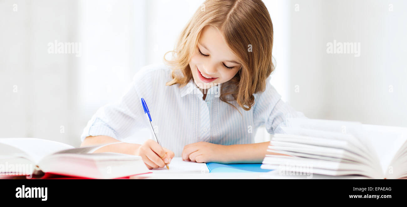 student girl studying at school Stock Photo - Alamy