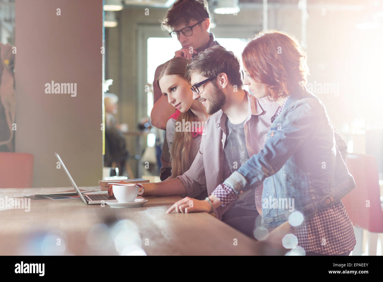 Four people laptop hi-res stock photography and images - Alamy