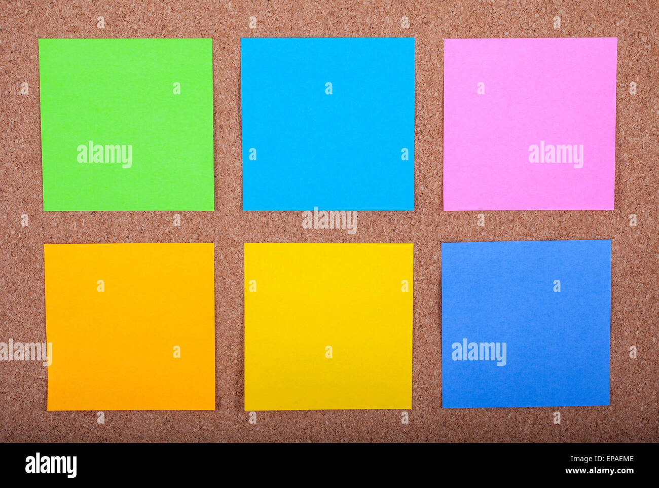 Six blank sticky notes on a noticeboard Stock Photo - Alamy