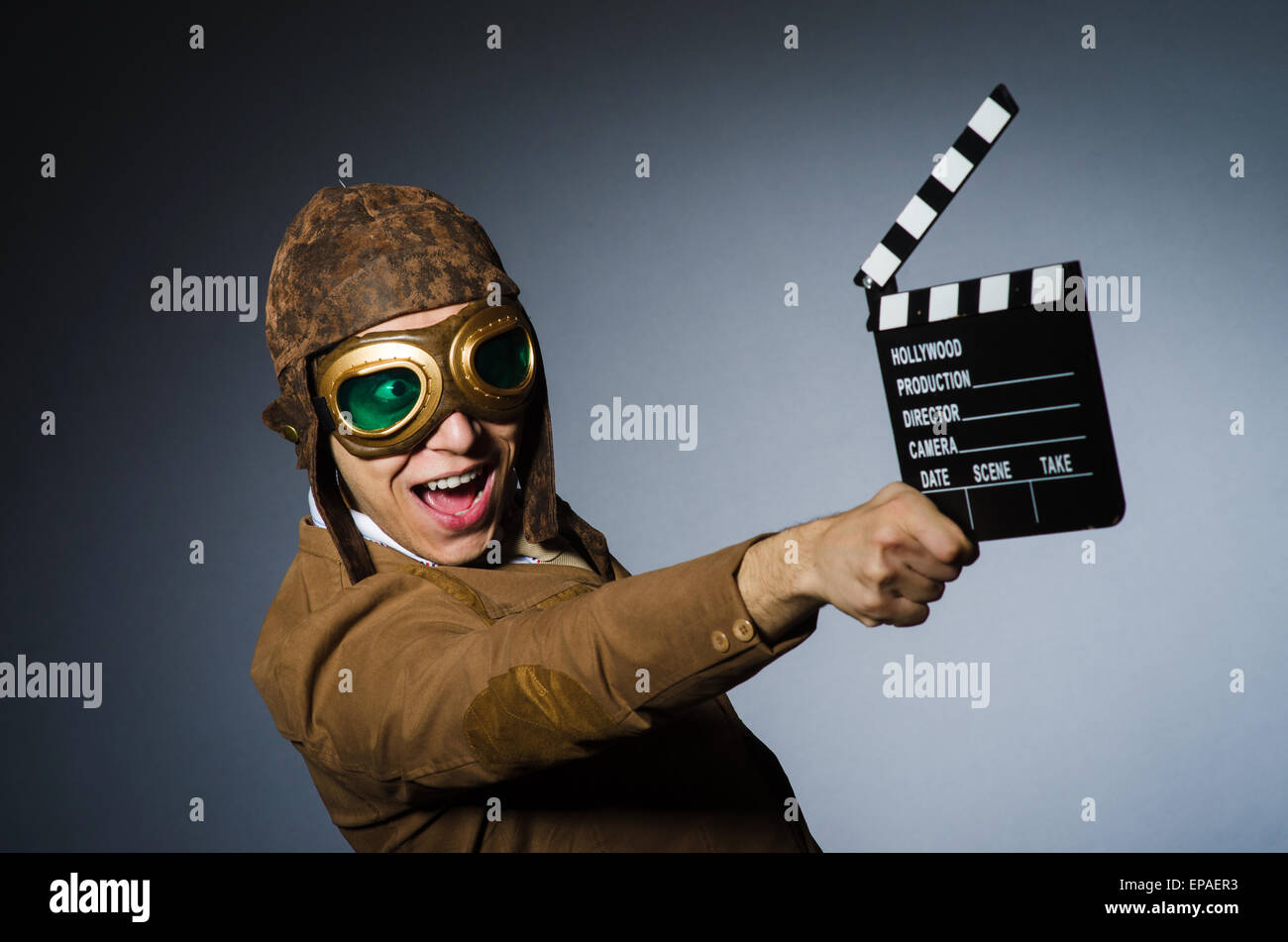 Funny pilot with goggles and helmet Stock Photo - Alamy