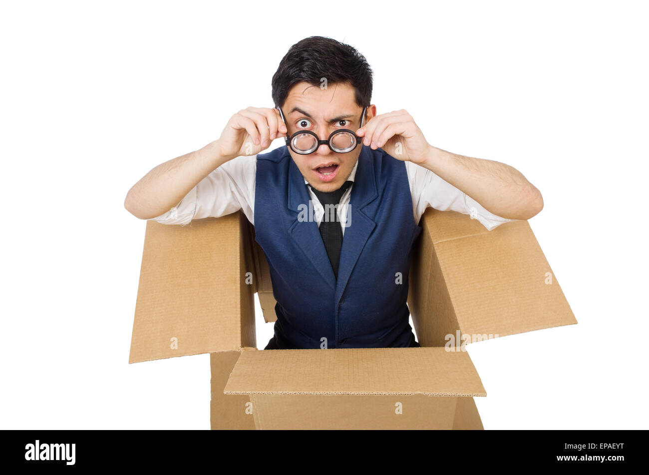 Man in thinking outside the box concept Stock Photo - Alamy