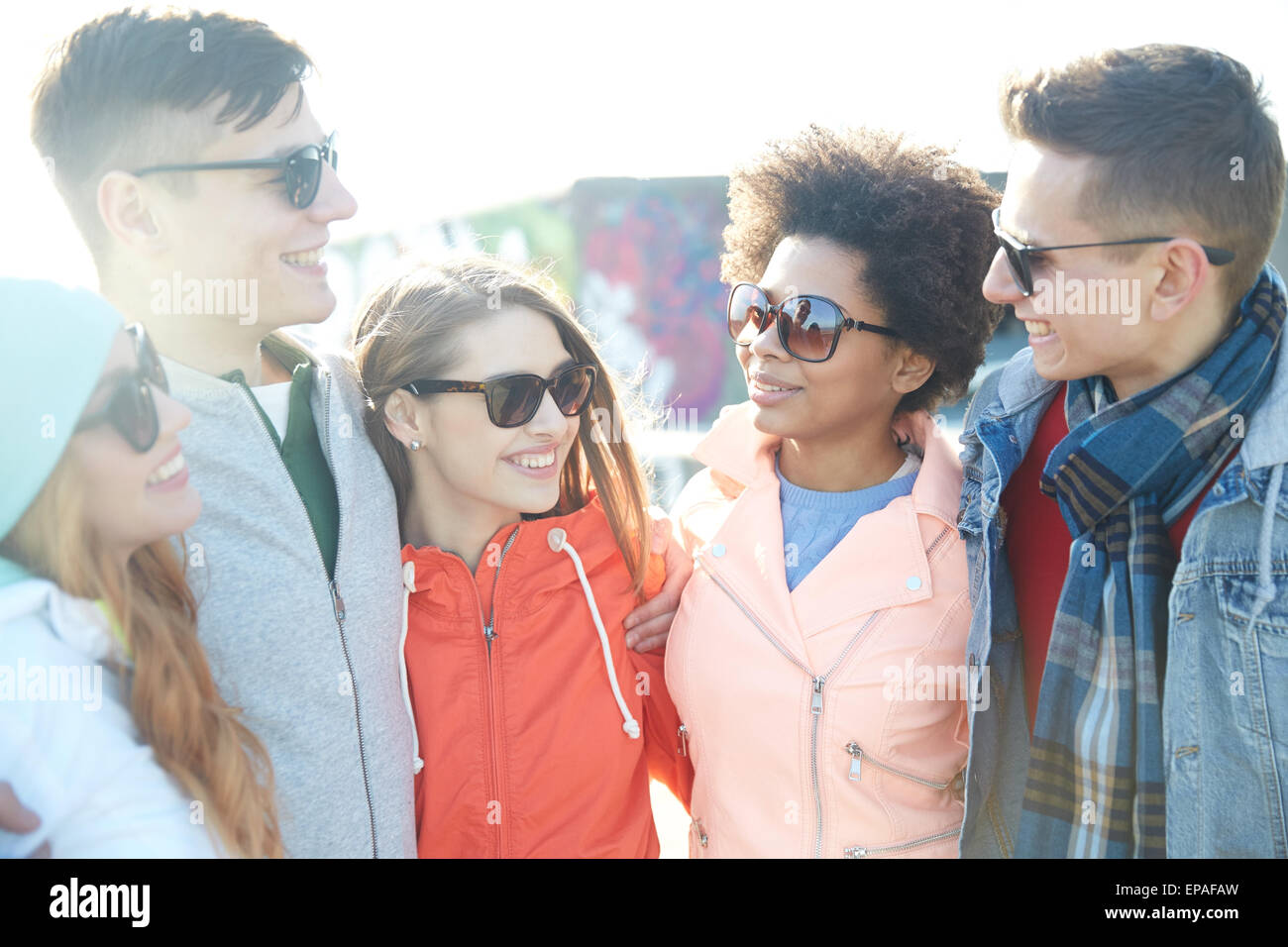 Teenagers talking street hi-res stock photography and images - Alamy