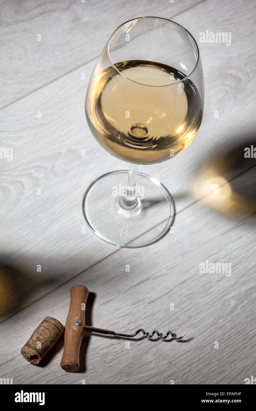Glass of white wine on wooden table. Top view Stock Photo - Alamy