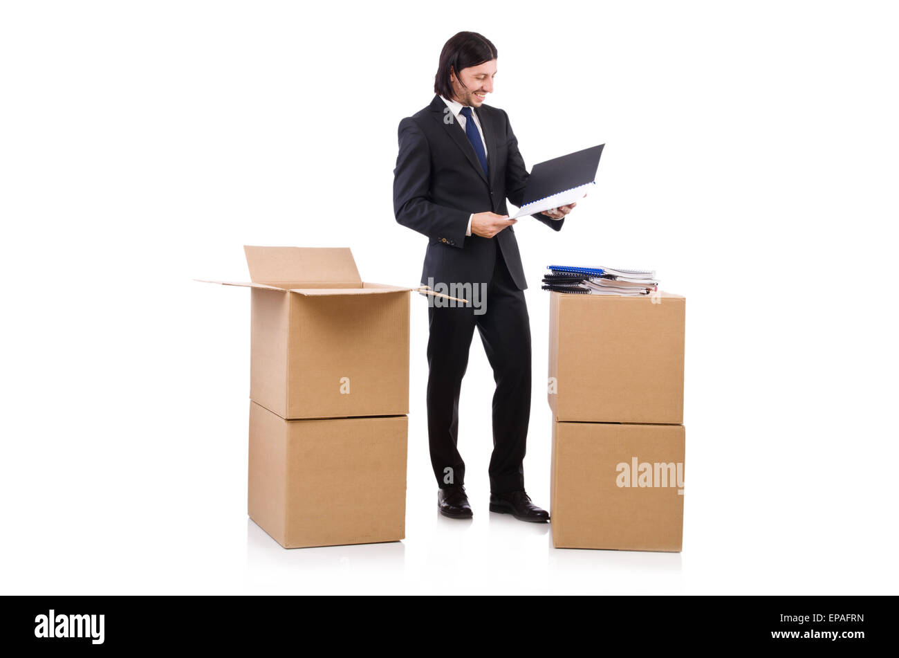 Man with boxes full of work Stock Photo - Alamy