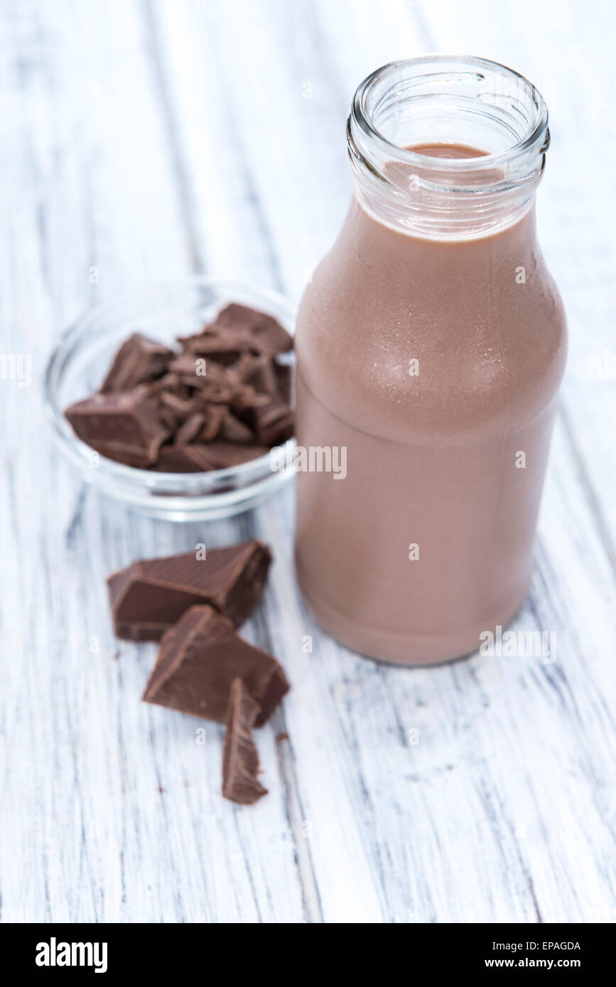 Milk Beverage (Chocolate taste) on a rustic wooden table Stock Photo ...
