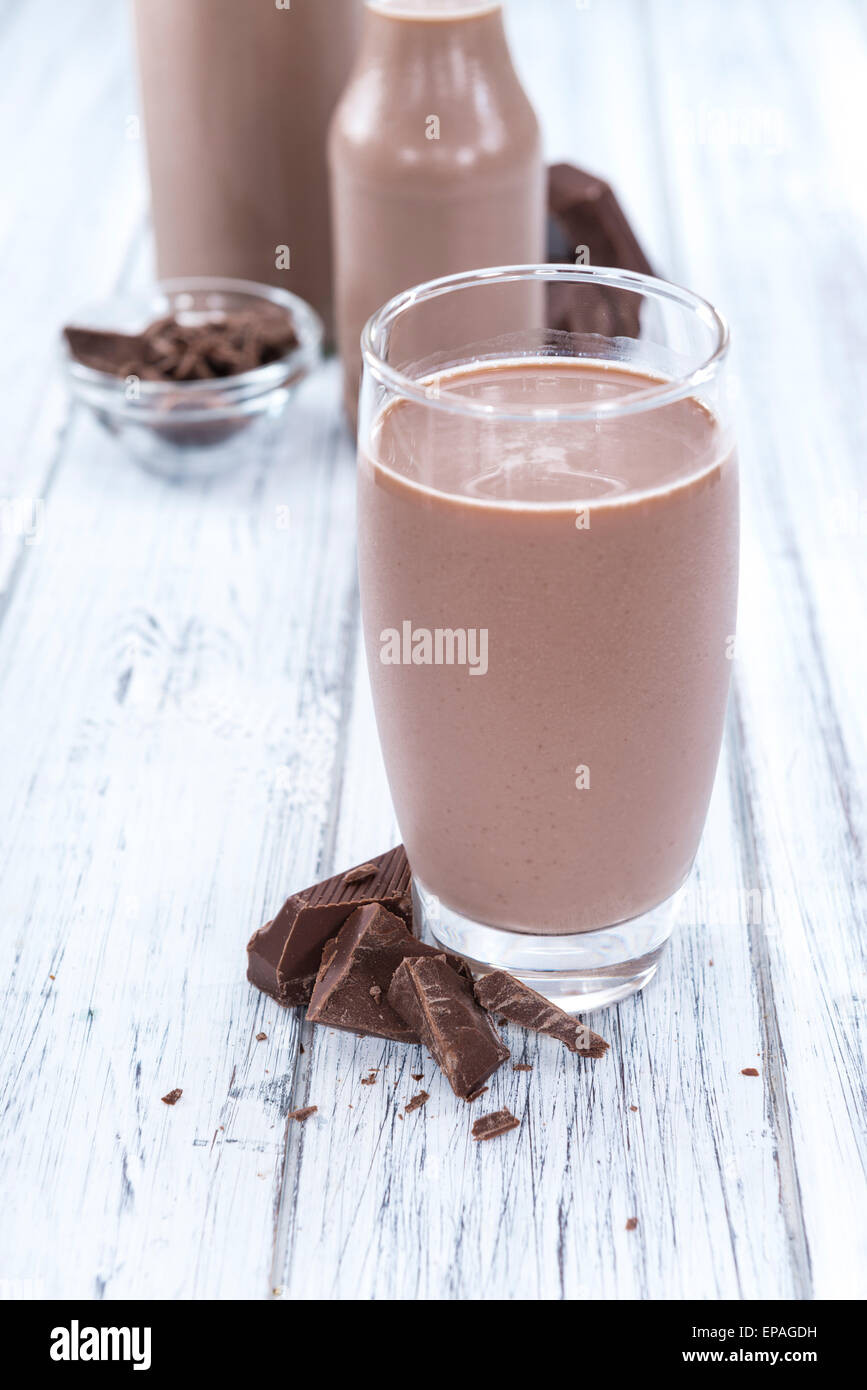 Fresh made Chocolate Milk on a bright wooden background Stock Photo - Alamy