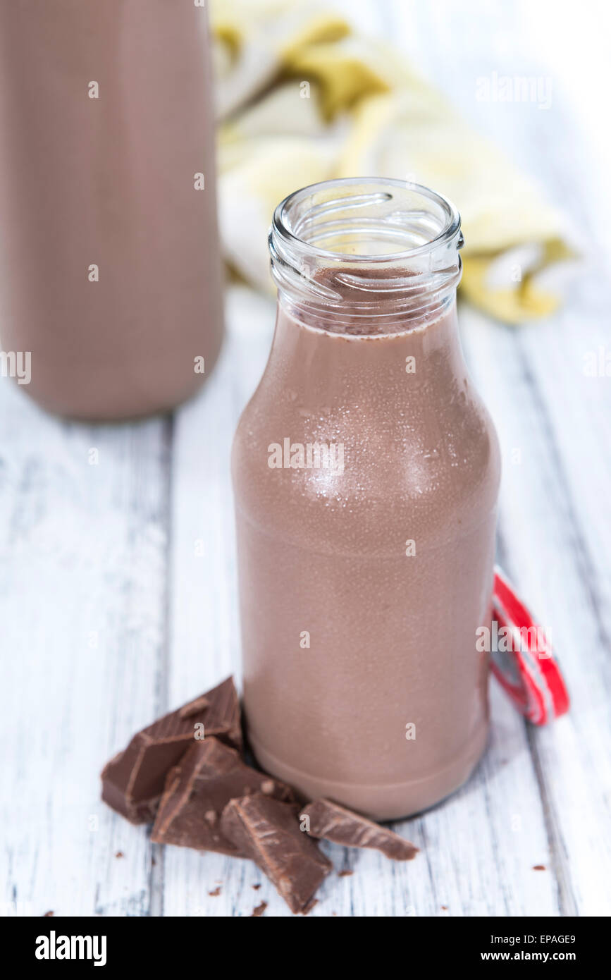Cold Chocolate Milk drink (close-up shot) on wooden background Stock ...