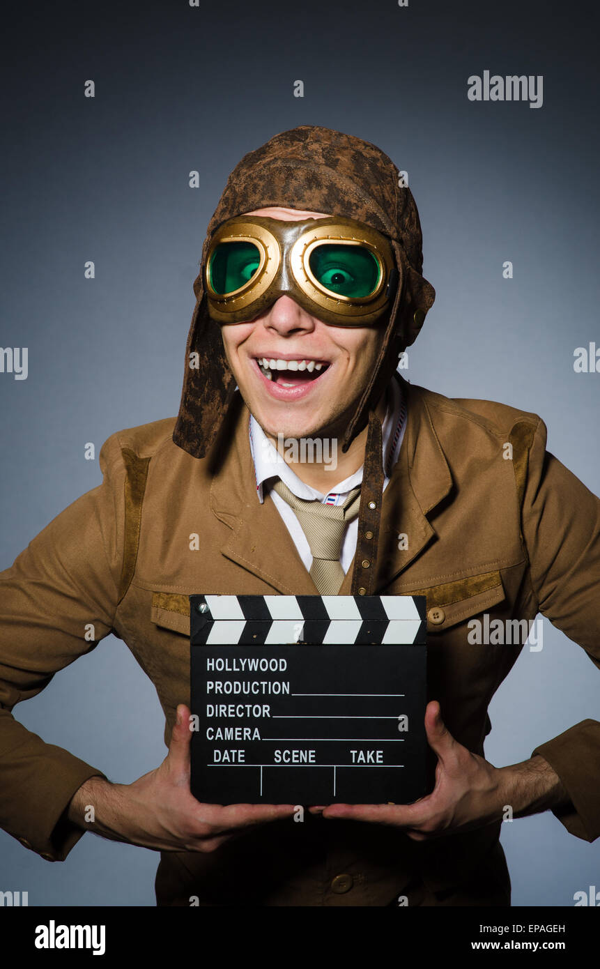 Funny pilot with goggles and helmet Stock Photo - Alamy