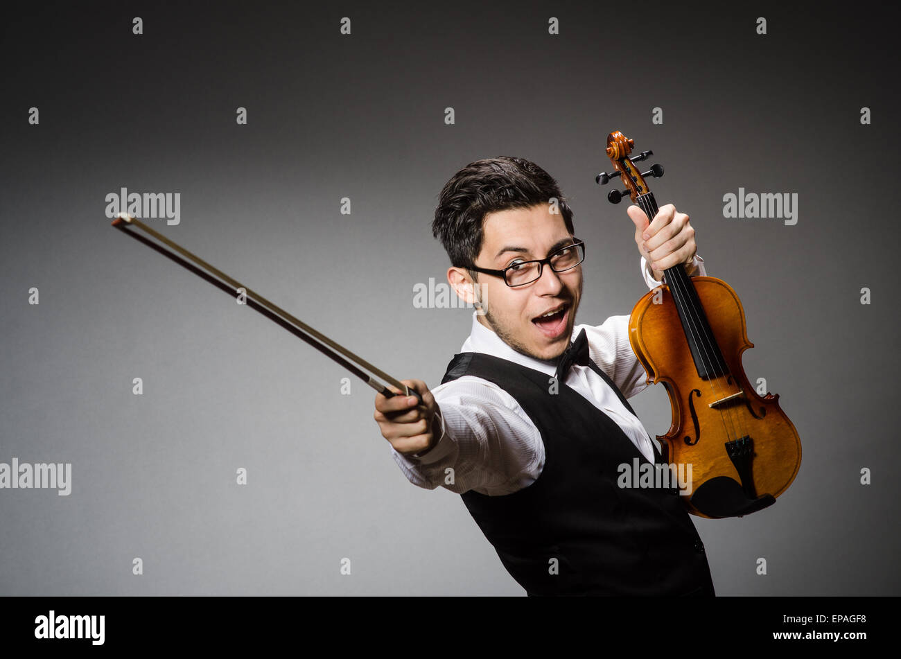 Funny violin player with fiddle Stock Photo - Alamy