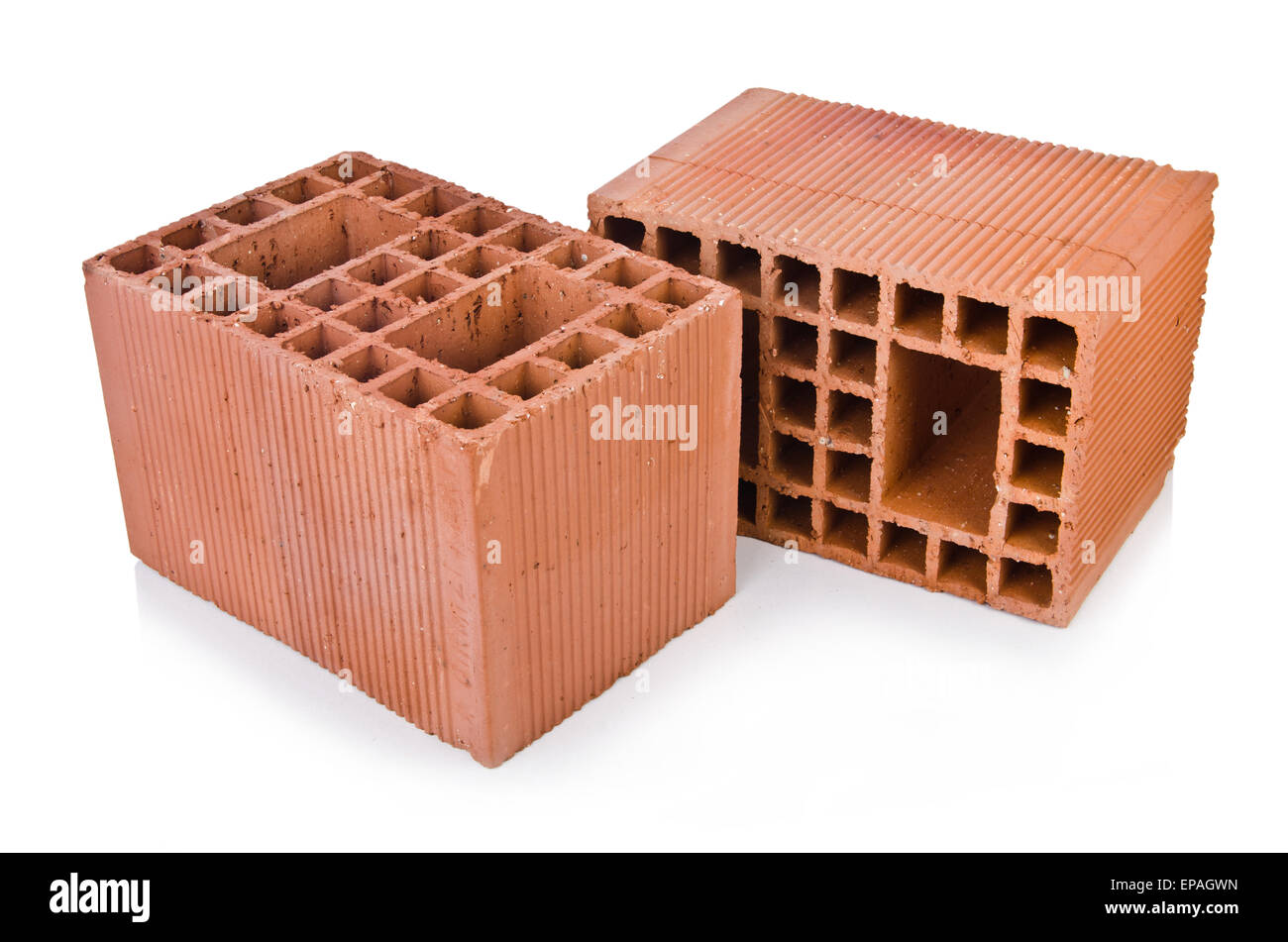 Stack of clay bricks isolated on white Stock Photo - Alamy