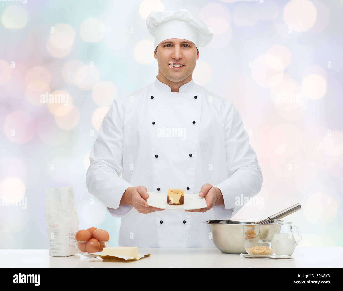 Smiling man holding baking hi-res stock photography and images - Alamy
