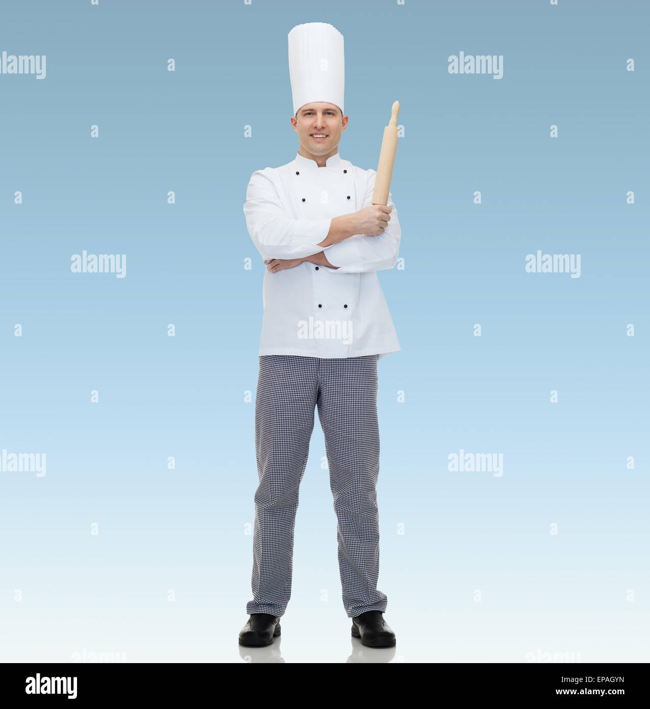 happy male chef cook holding rolling pin Stock Photo - Alamy