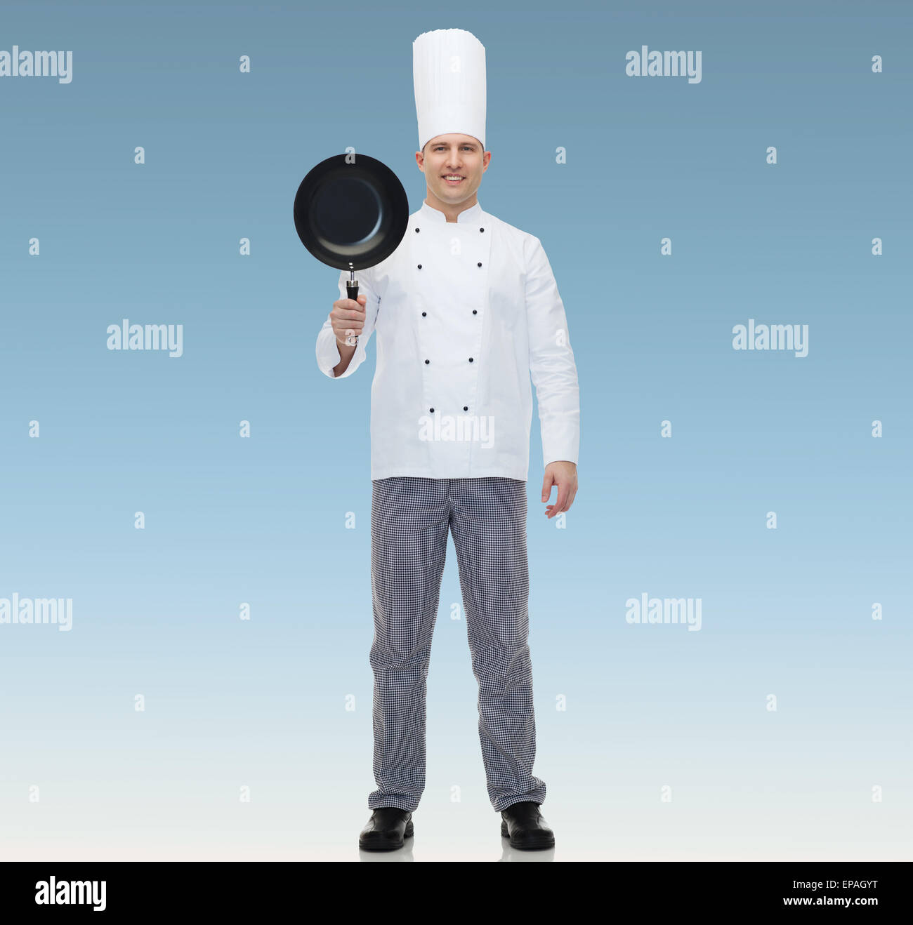 happy male chef cook holding frying pan Stock Photo - Alamy