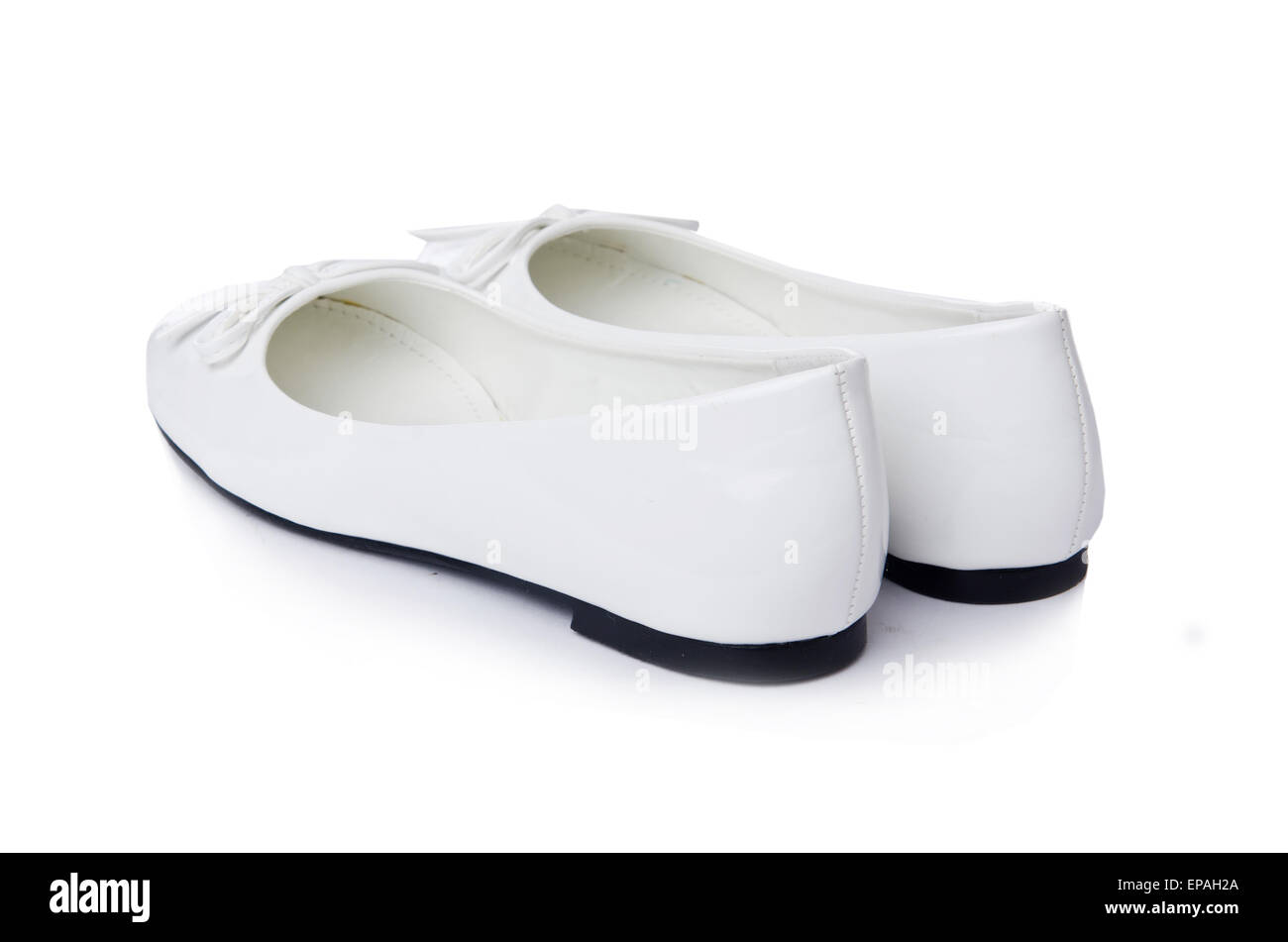 Golden ballet shoes isolated on white Stock Photo - Alamy