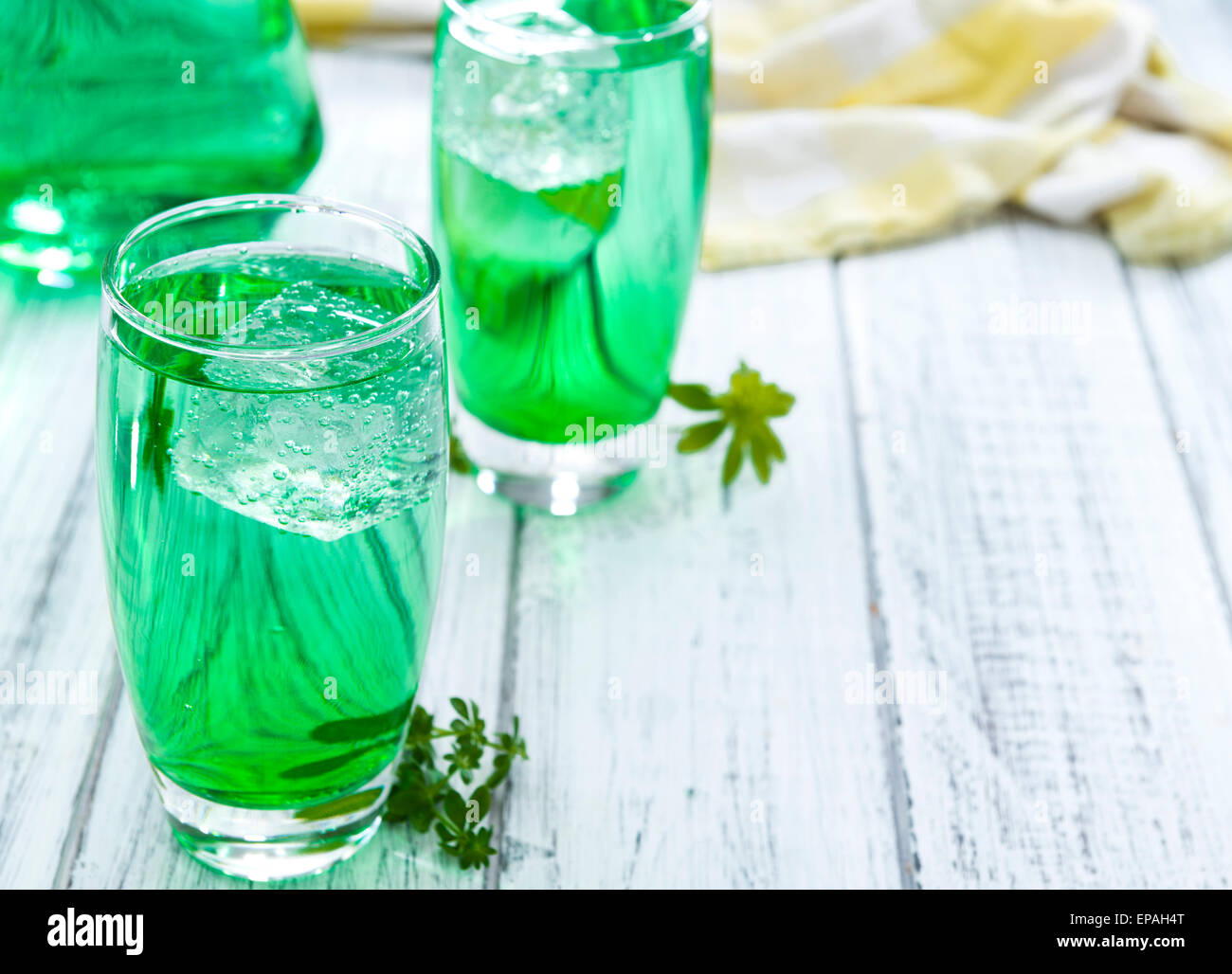 Cold beverage with Woodruff taste in a glass Stock Photo - Alamy