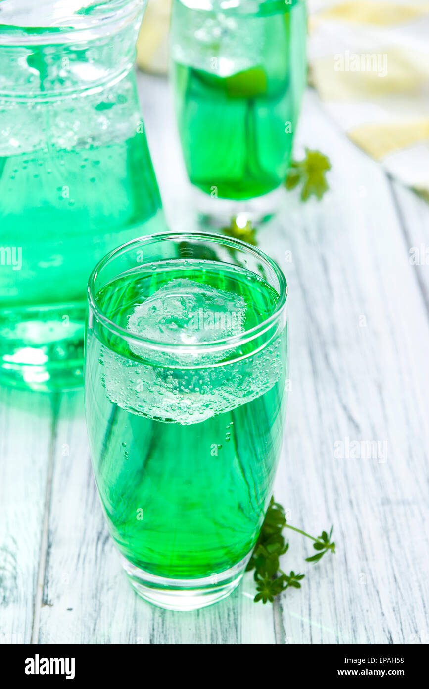 Cold beverage with Woodruff taste in a glass Stock Photo - Alamy