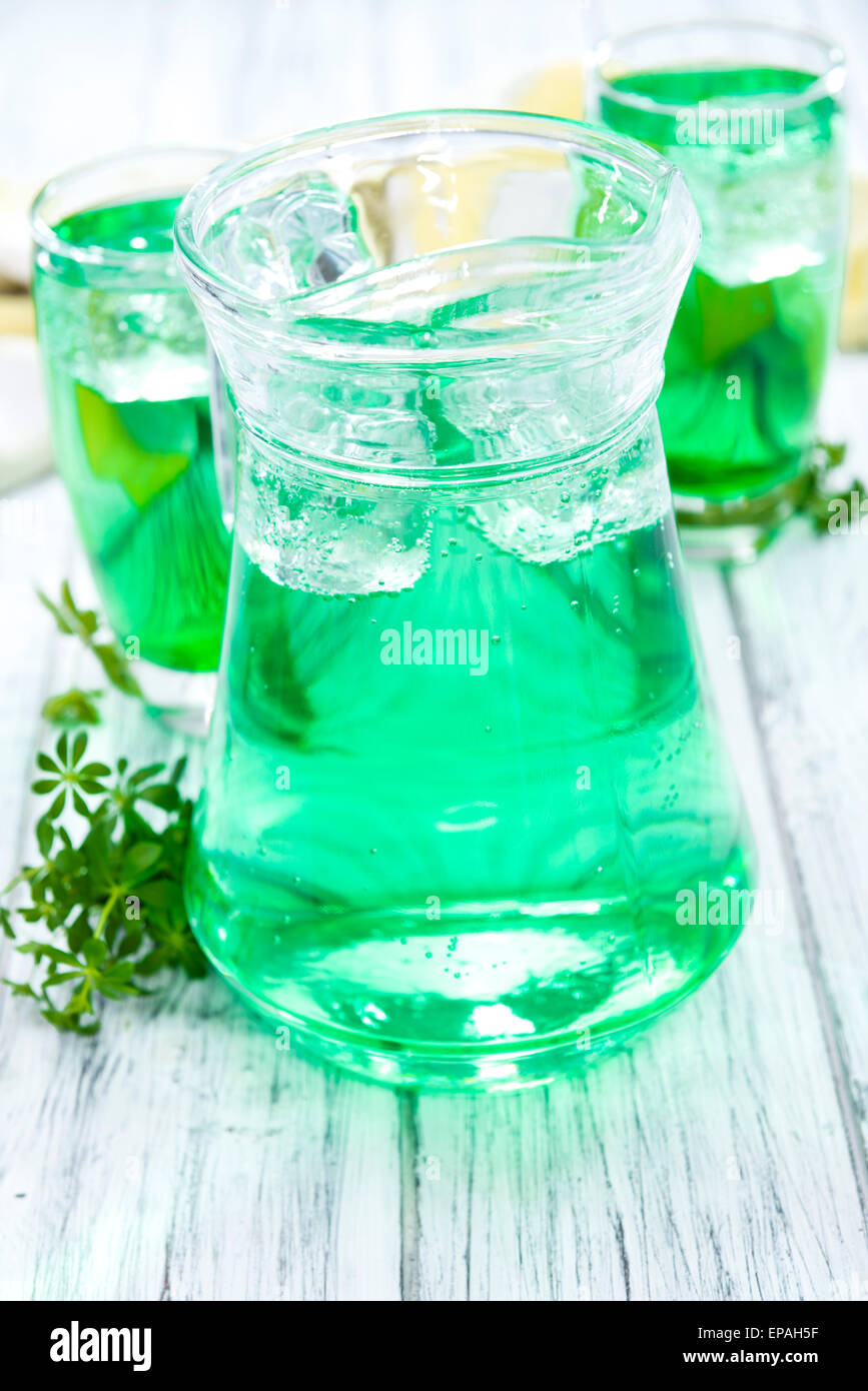 Cold beverage with Woodruff taste in a glass Stock Photo - Alamy