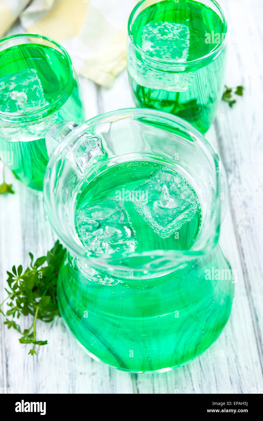 Cold beverage with Woodruff taste in a glass Stock Photo - Alamy