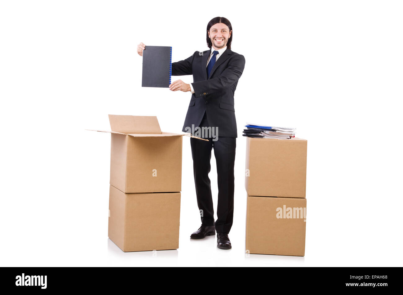 Man with boxes full of work Stock Photo - Alamy